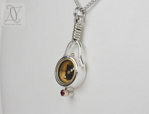 Elegant Silver Compass Pendant with Ruby | Rock Water Studio