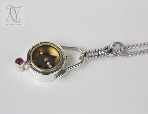 Elegant Silver Compass Pendant with Ruby | Rock Water Studio
