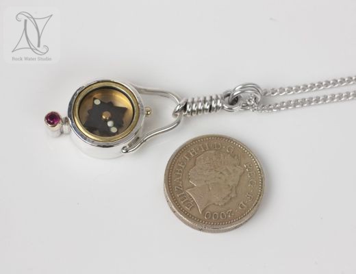 Elegant Silver Compass Pendant with Ruby | Rock Water Studio